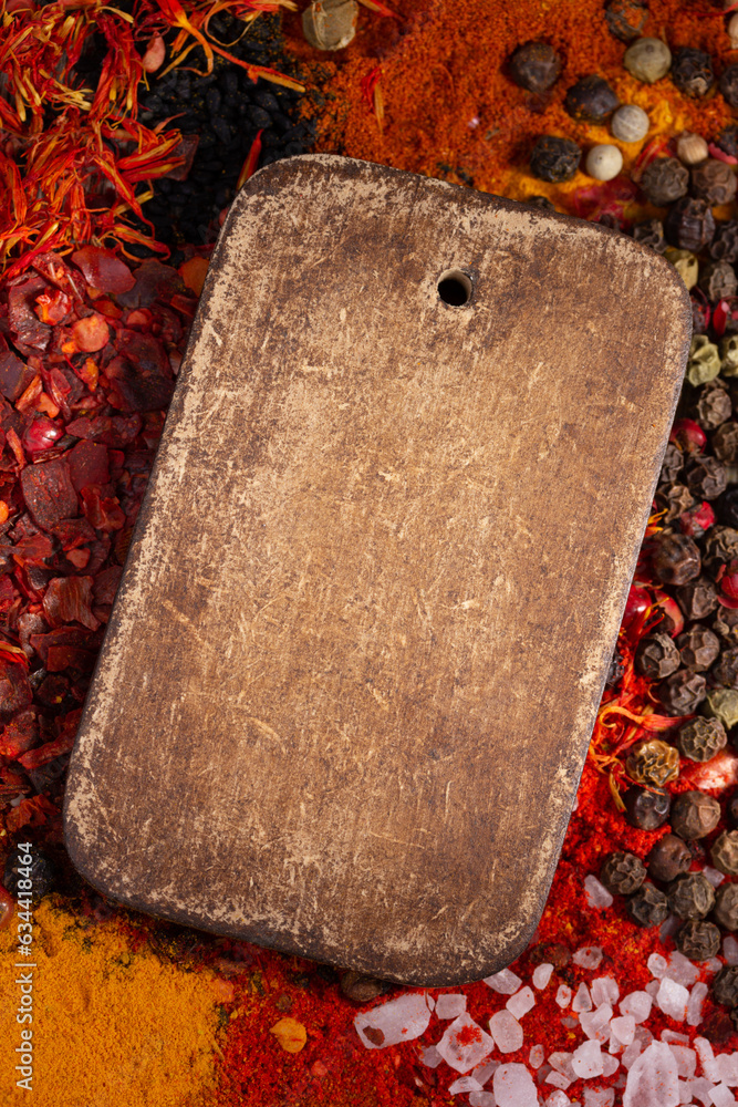 Variety of spices and wood name plate label as background. Food spice ...
