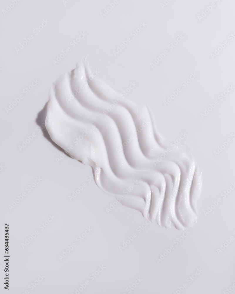 White beauty cream smear smudge on white background. Cosmetic skincare ...