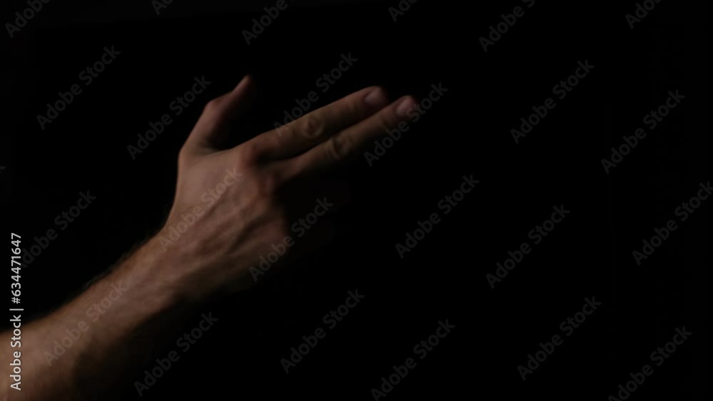 A hand forming a gun-like shape by extending the index and middle ...