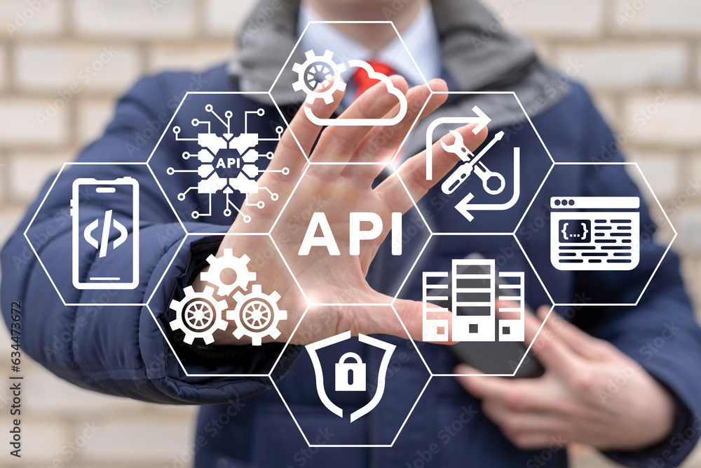 Foto de Businessman using virtual touch screen sees abbreviation: API ...