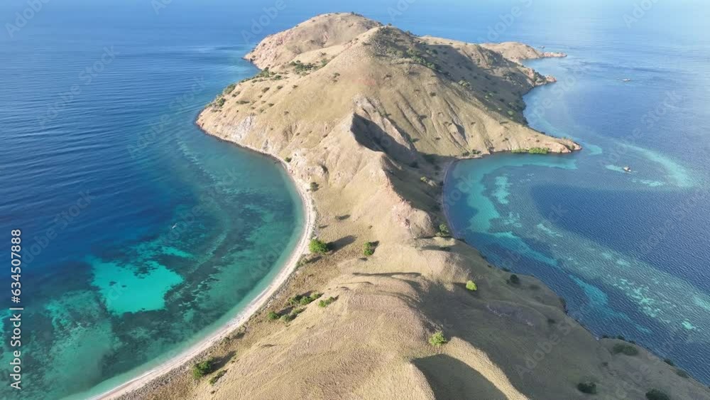Beautiful coral reefs fringe the scenic island of Gili Lau Laut in ...