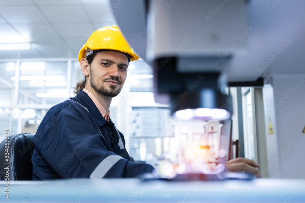 Specialist male engineer workers in manufacturing factory workplace ...