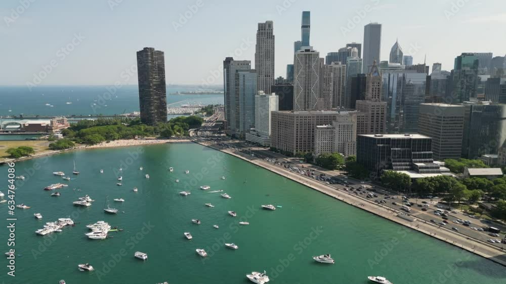 Drone Footage of Chicago skyline and lakefront with busy traffic and ...