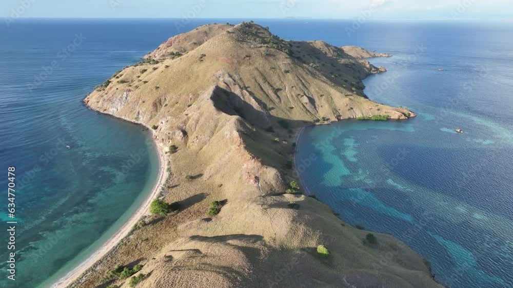 Beautiful coral reefs fringe the scenic island of Gili Lau Laut in ...