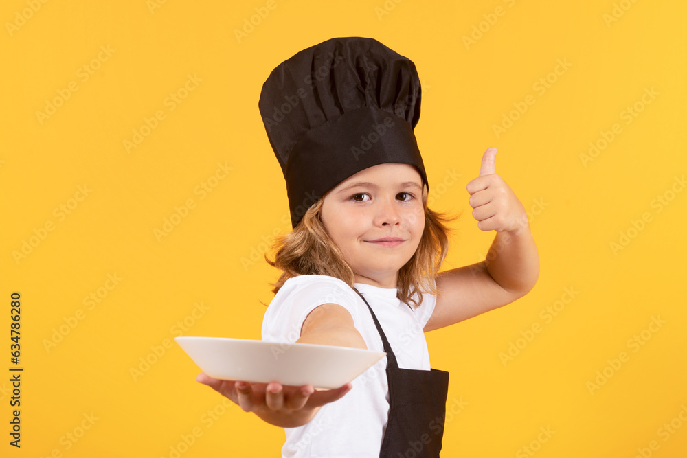 Funny child cook with cooking plate. Cooking children. Chef kid boy in ...