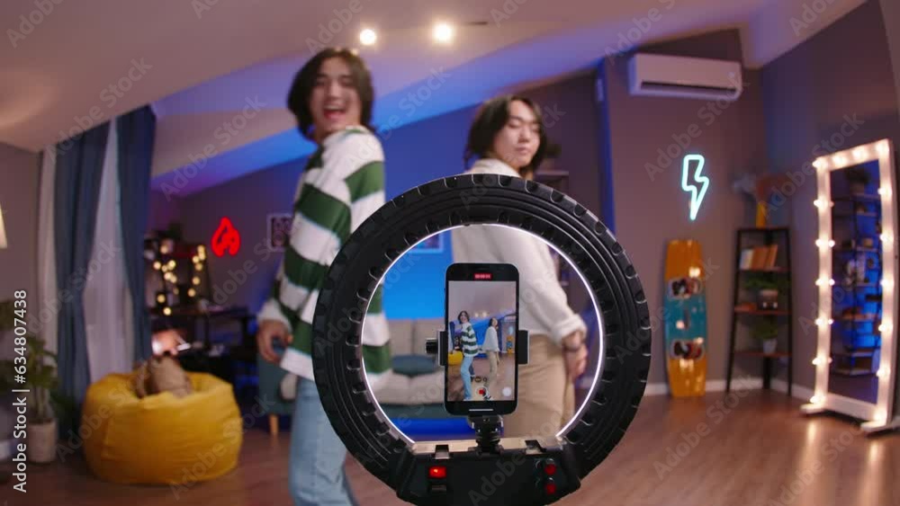 Two Gen Z Asian friends K-pop dancers record trending reels for social ...