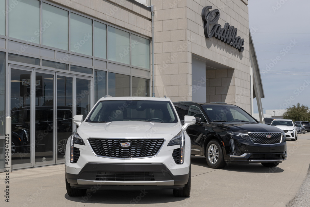 Cadillac XT4 and XT6 display at a dealership. Cadillac offers the XT4 ...