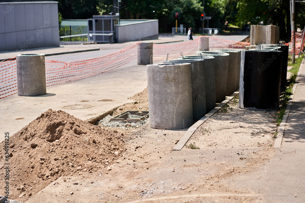 Laying concrete manholes and drain pipes for stormwater system ...