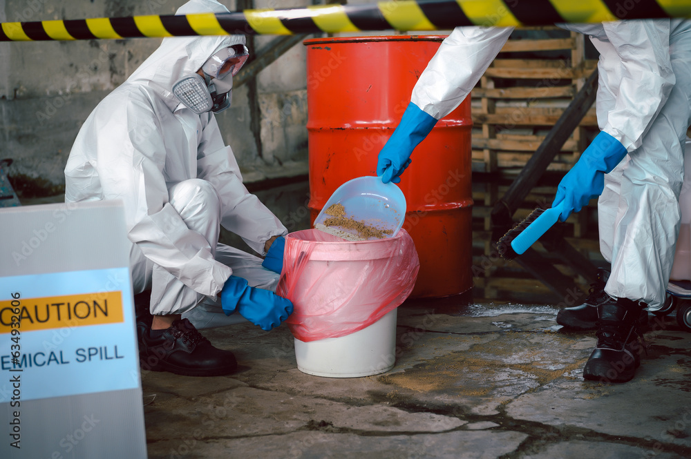 Clean up Chemical Liquid Spill. Scoop Materials into Toxic Waste Red Bag and Thick Plastic ...