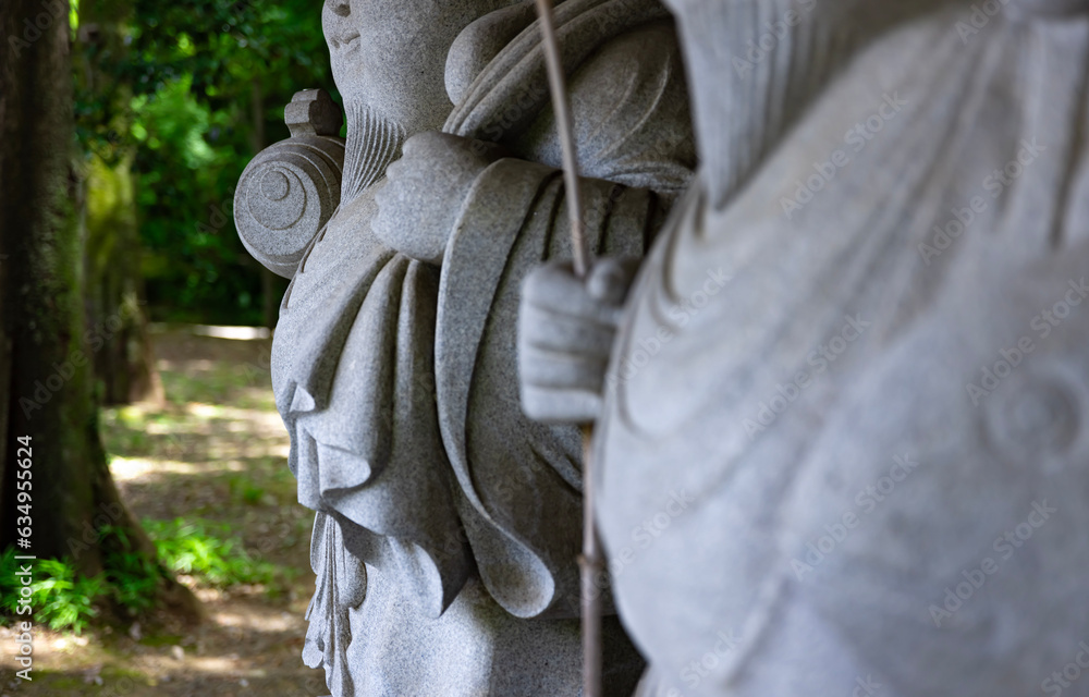 Japanese guardian statues at the traditional street in Tokyo Stock ...