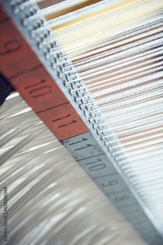 Cotton threads in industrial cotton in a weaving factory, machine ...