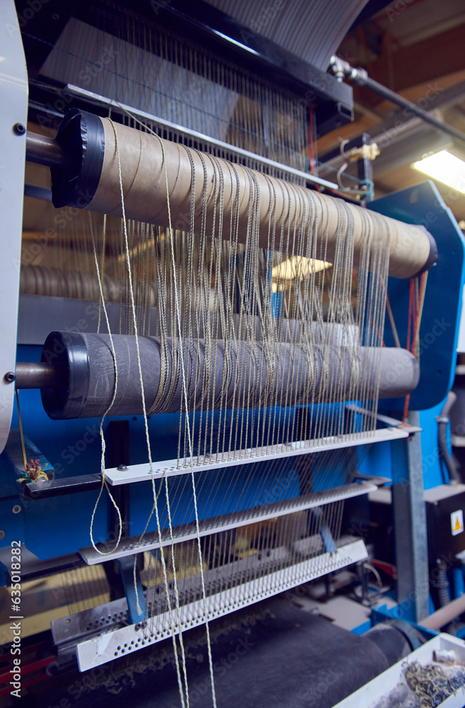 Cotton threads in industrial cotton in a weaving factory, machine ...