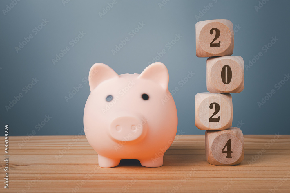Wooden Cube turns from 2023 to 2024 on wooden table, Happy new 2024 ...