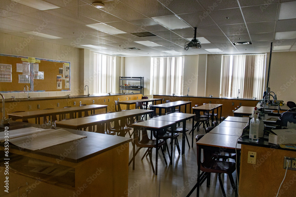 Science laboratory classroom - wooden lab tables with black countertops ...