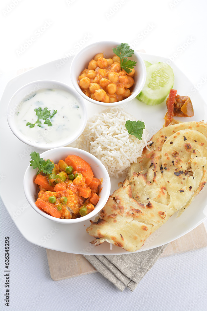 indian baked roti prata canai 2 pieces with spicy chilli curry chicken ...