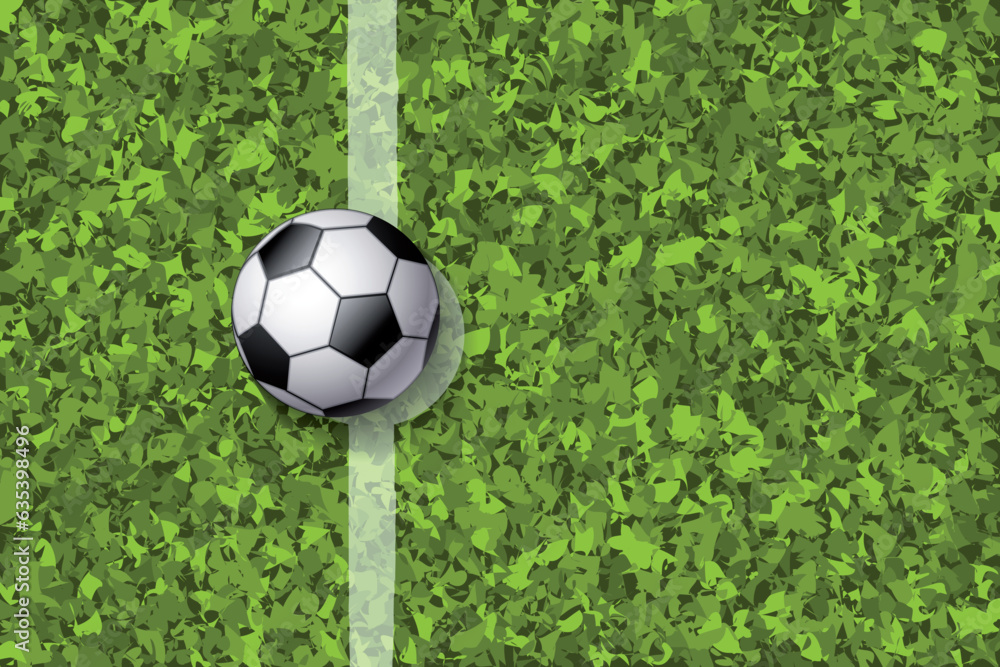 Top view of a ball crossing a white line on a green football field ...