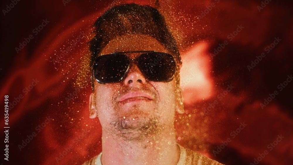 Crazy man sprinkles himself with sparkle particles. Fun video, funny ...