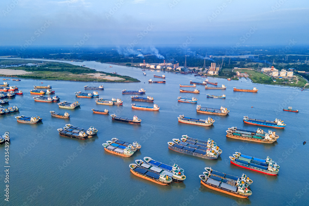 Hundreds of vessels are seen anchored in Karnafuli river near port in ...