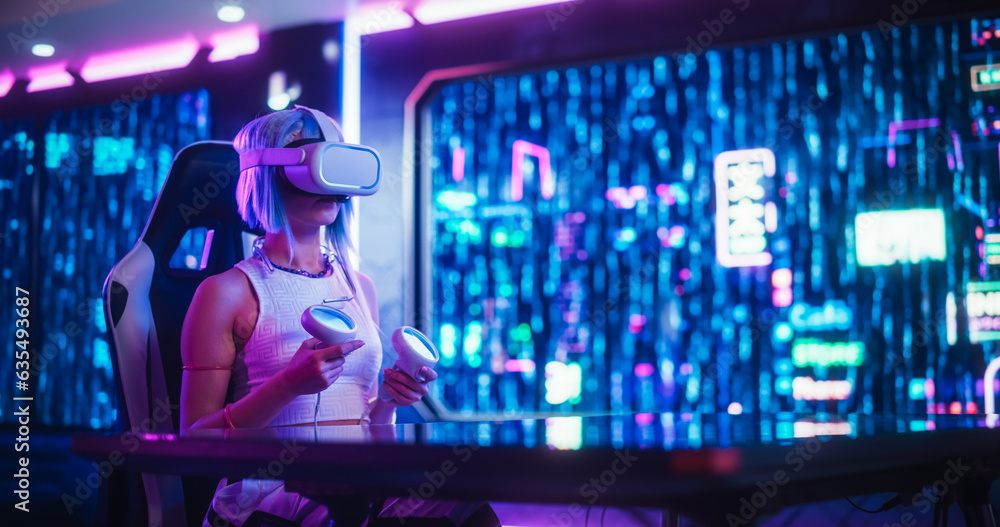 Cyberpunk Gamer Girl Wearing a Virtual Reality Headset and Using ...