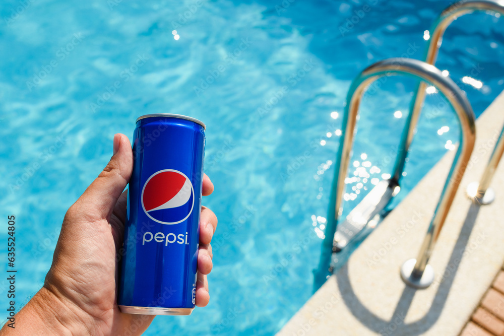 Anapa, Russia - July 2023: Cold Pepsi in hand on the background of the ...