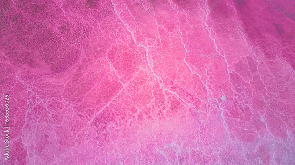 Aerial view of pink salt lake. Salt production plants evaporated brine ...