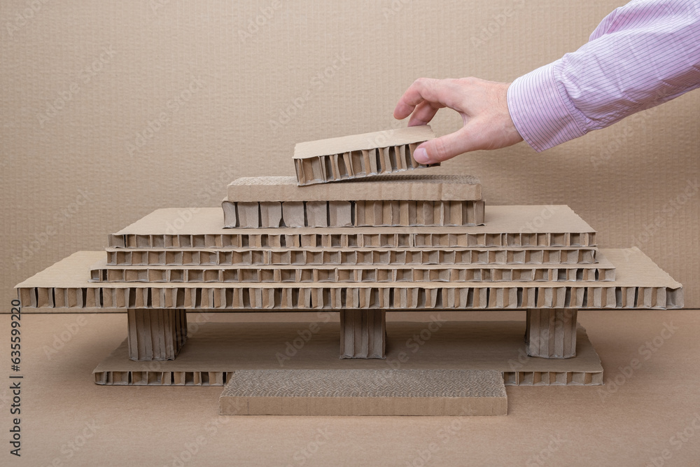 Basic architectural cardboard house model in three dimensions from the ...