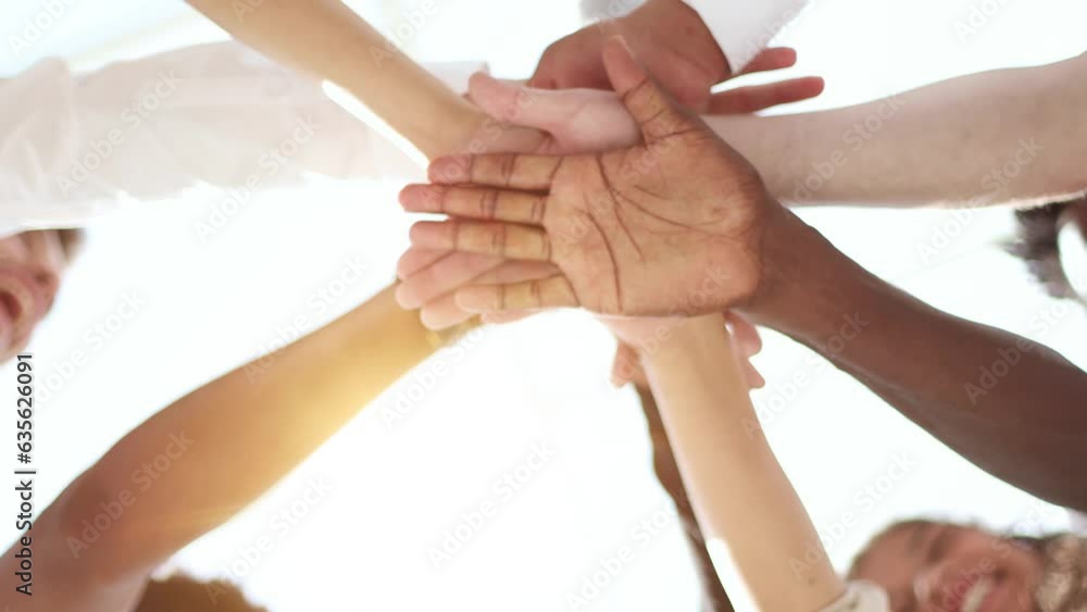 Young happy people put their hands together. Community of multiethnic ...