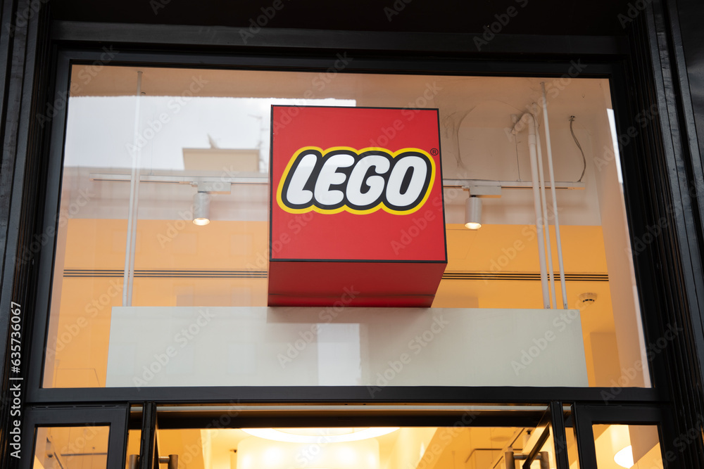 Lego logo brand and text sign on entrance facade store flagship shop ...