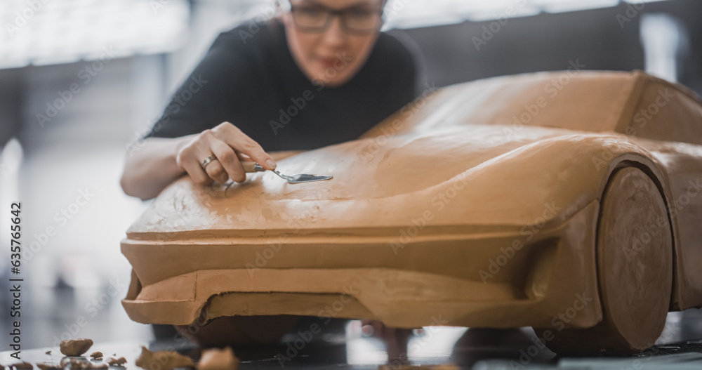 Female Car Modeler Enjoying Creative Work Process on a Concept Car Made ...
