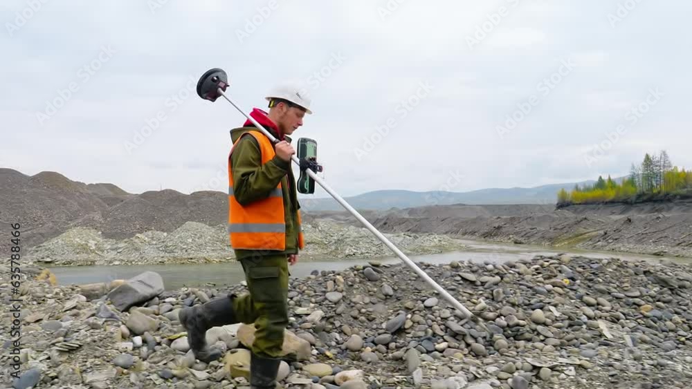 Surveyor Specialist Measures Gold Mine Area By Theodolite Equipment ...