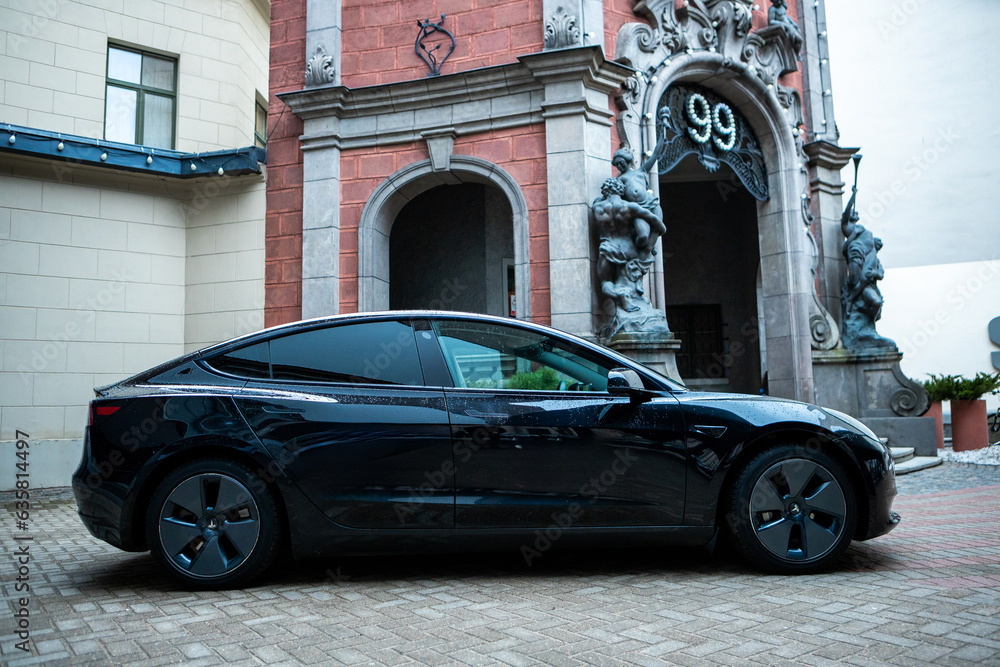 The Tesla Model 3 is a luxury all-electric four-door sedan compact ...