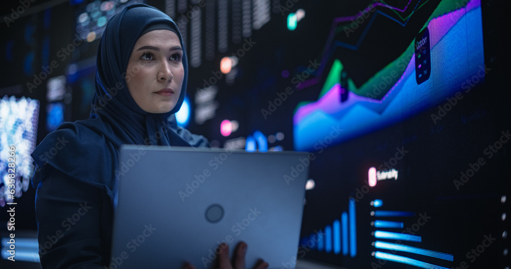 Muslim Female Data Center IT Engineer Standing in a Room with ...