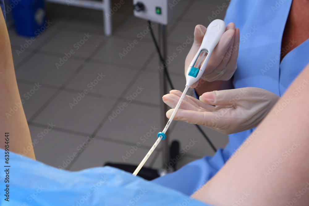 Contraceptive IUD. Installation of a birth control system. The ...