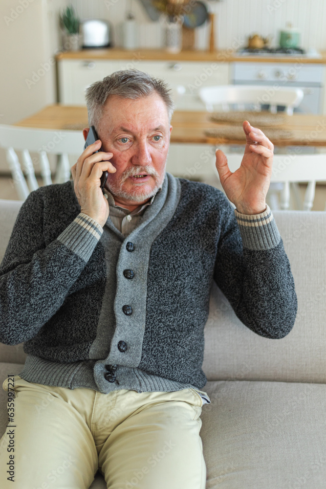 Happy middle aged senior man talking on smartphone with family friends ...