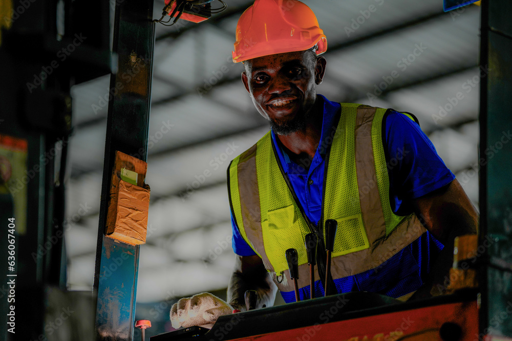 Factory engineer African man standing confidence with green working ...