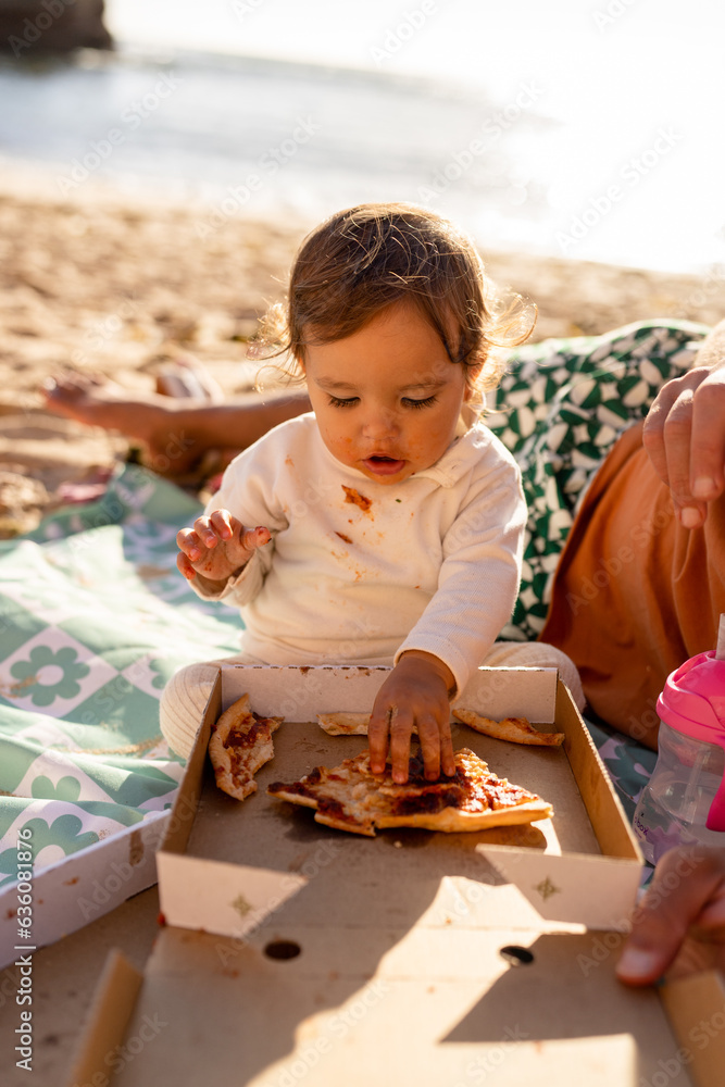 Baby eating pizza Stock Photo | Adobe Stock