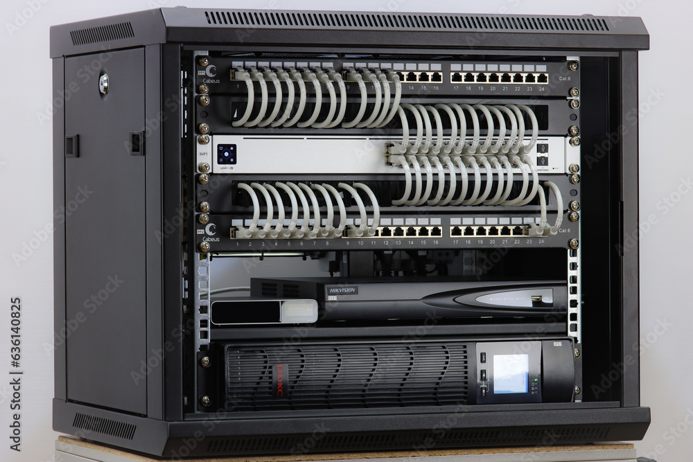 Telecommunication rack with Ethernet switch, video surveillance system ...