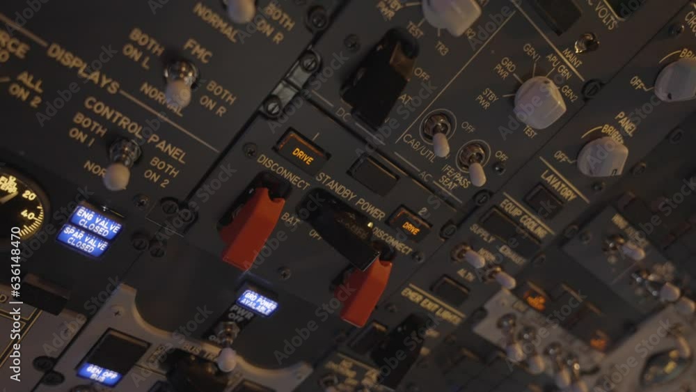 Control panels in a Boeing 737 cockpit. Jet airliner interior, with ...