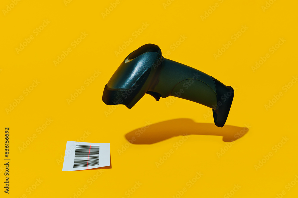 a barcode scanner scans a barcode Stock Photo | Adobe Stock