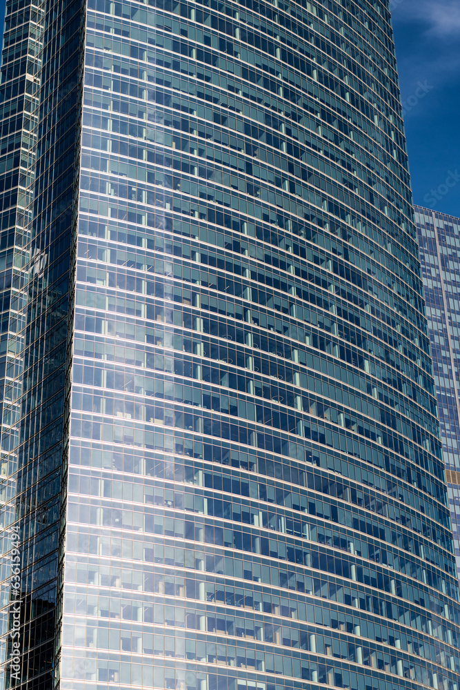skyscraper with glassy facade. modern glass building. skyscraper in ...