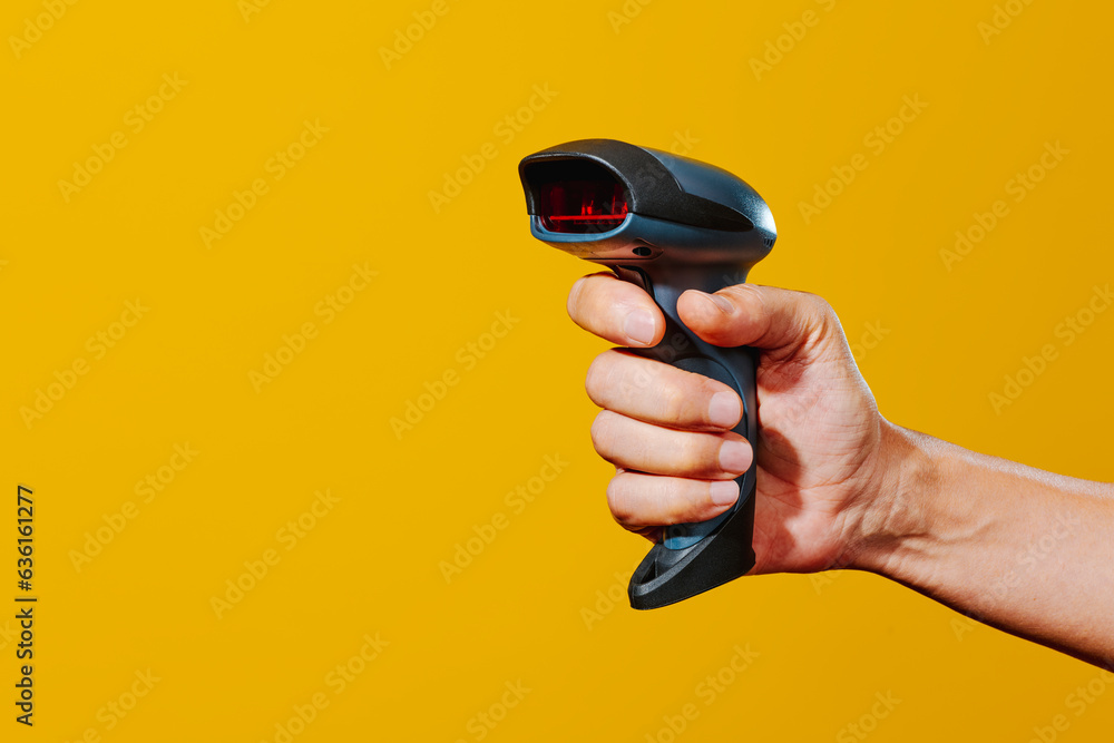 man with a barcode scanner in his hand Stock Photo | Adobe Stock