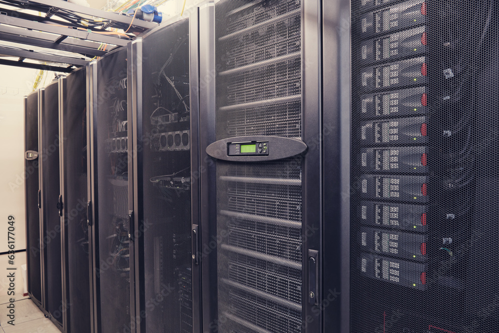 In the server room, the UPS battery is connected to an emergency power ...