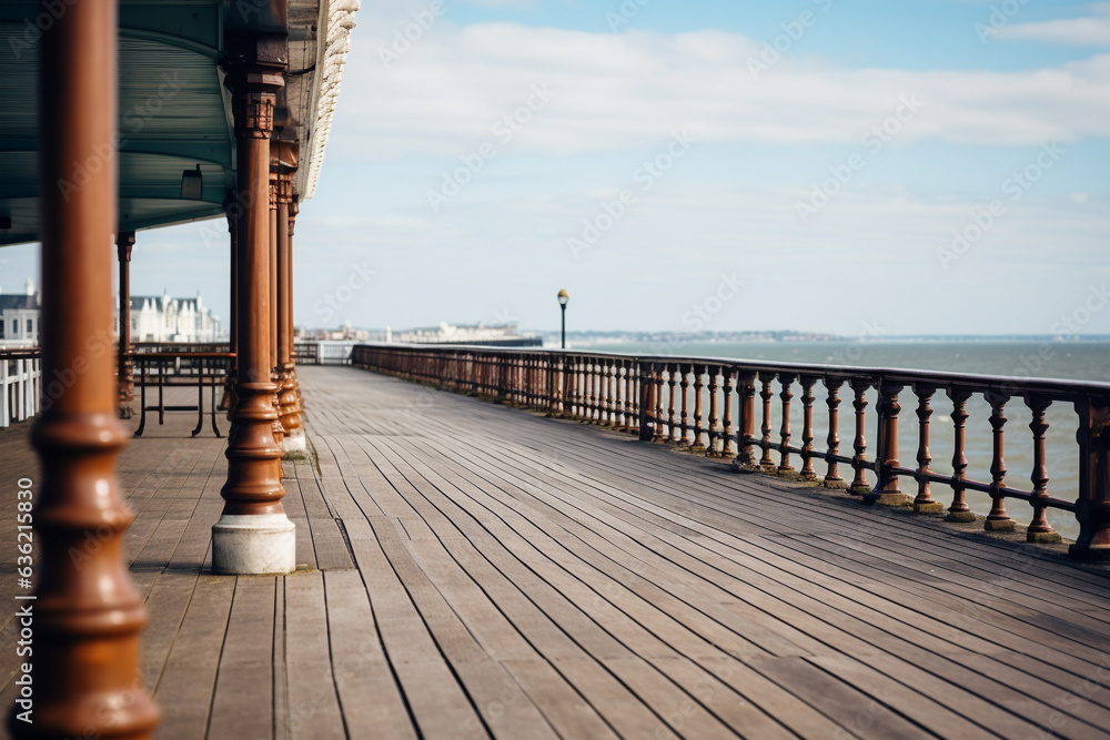scenic wooden pier serves as the perfect spot by the sea for capturing ...