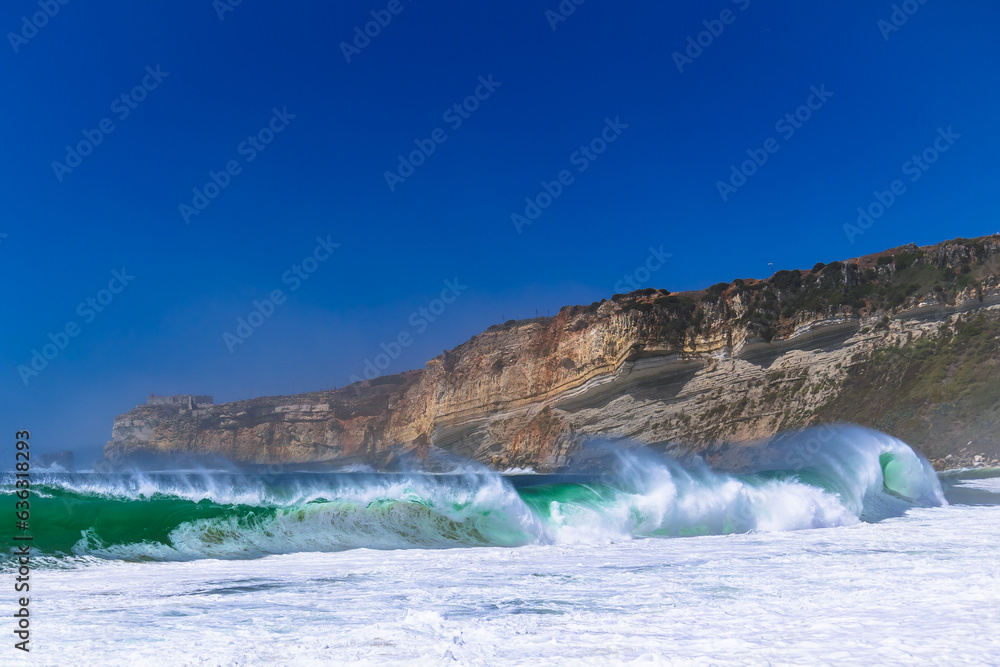 Nazare beach in Portugal, home of oonw of the biggest waves in the ...