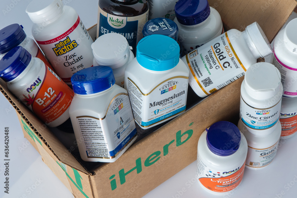 Vitamins, minerals and micronutrients from iHerb box. Lots of different ...