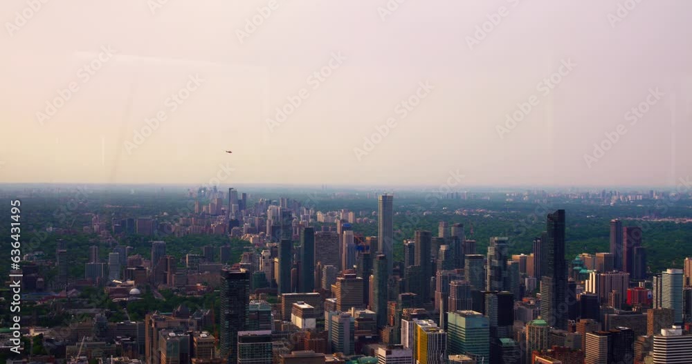 Cinematic shot of urban thrill as helicopter soars above downtown ...