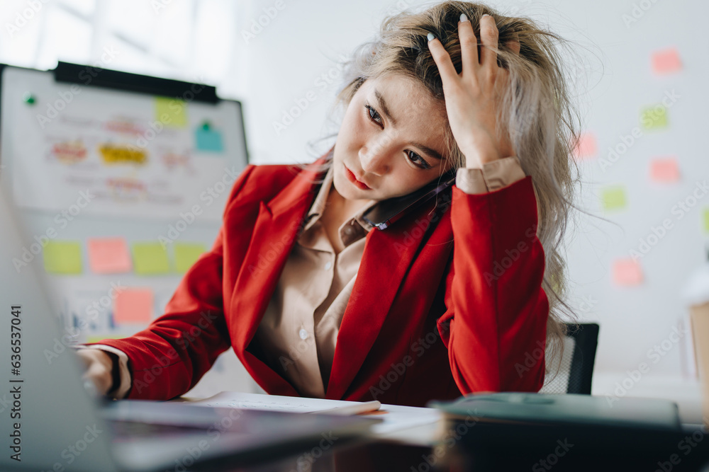 Busy businesswoman wearing a suit busy with work workaholic while ...