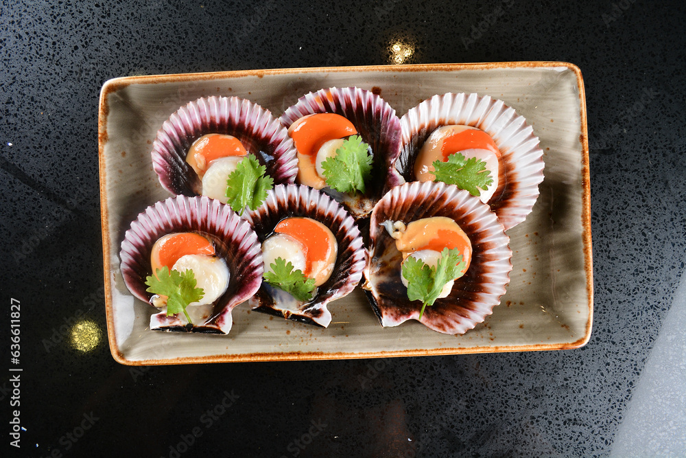 iced mixed raw seafood platter scallop, fish, crab, clam, shell, prawn ...