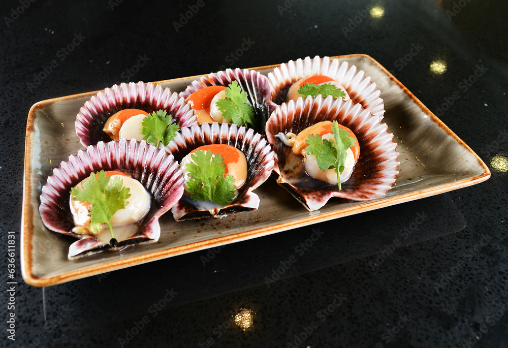 iced mixed raw seafood platter scallop, fish, crab, clam, shell, prawn ...