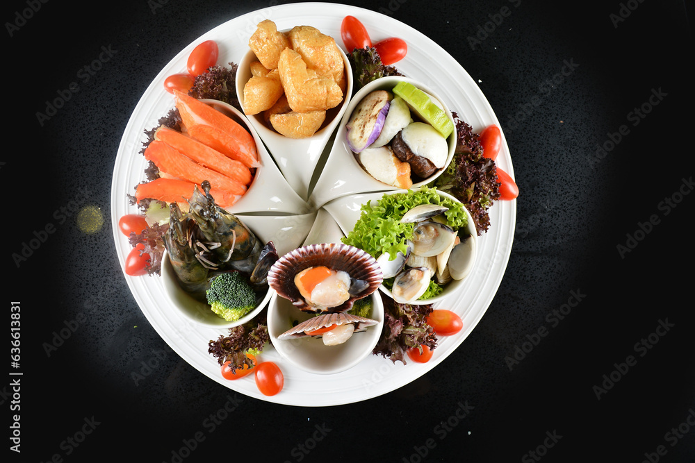 iced mixed raw seafood platter scallop, fish, crab, clam, shell, prawn ...